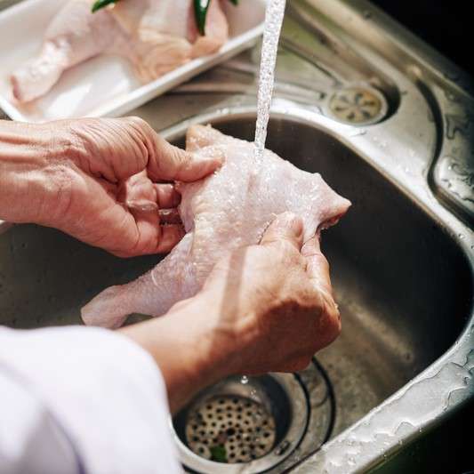 Why It's Always Wrong to Rinse Raw Chicken